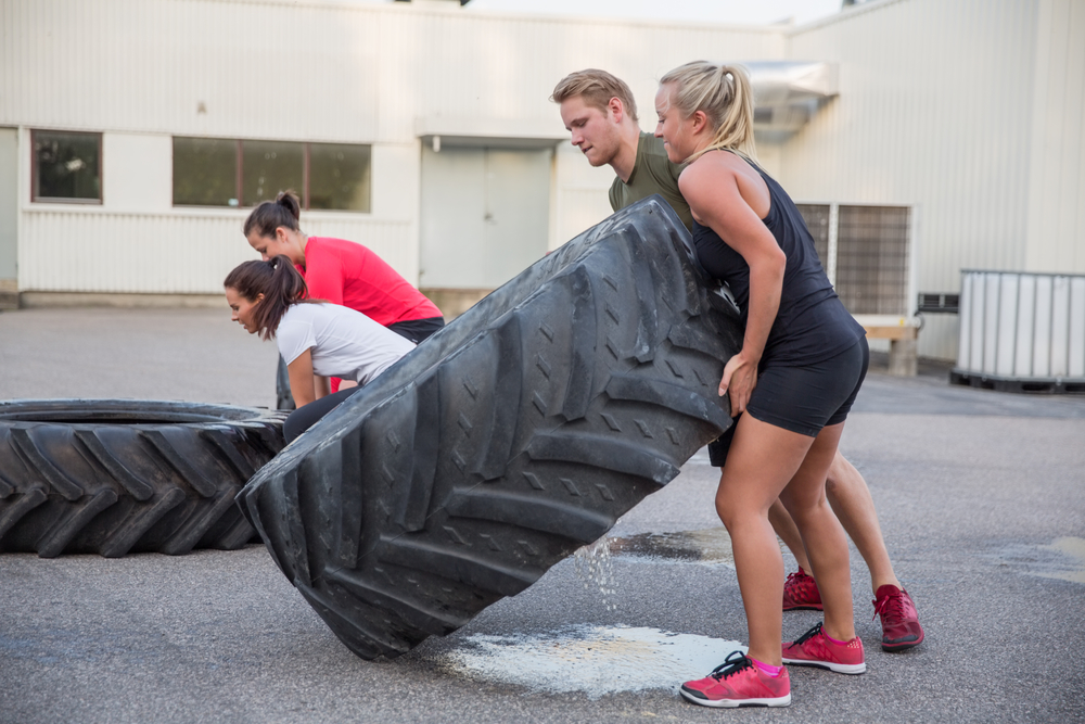 Flipping tractor tires as outdoor workout